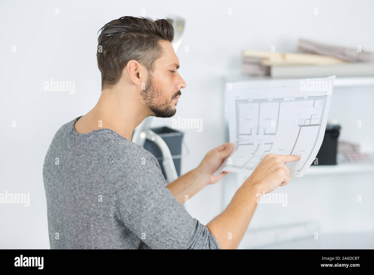 Checking plans hi-res stock photography and images - Alamy