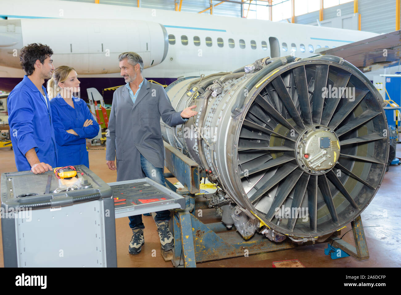 Aircraft maintenance mechanic in blue hi-res stock photography and ...