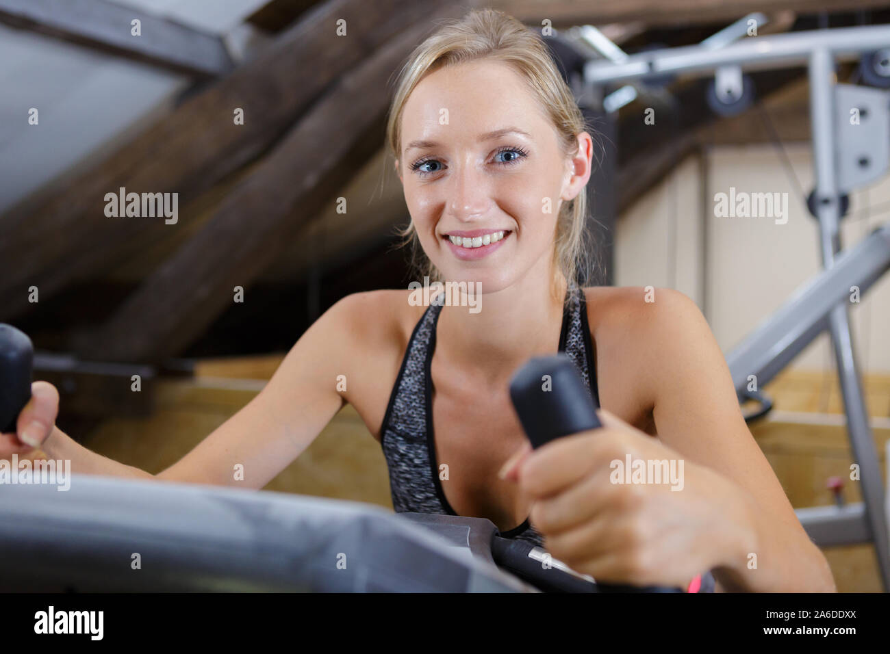 Woman exercise bike gym intense hi-res stock photography and images - Alamy