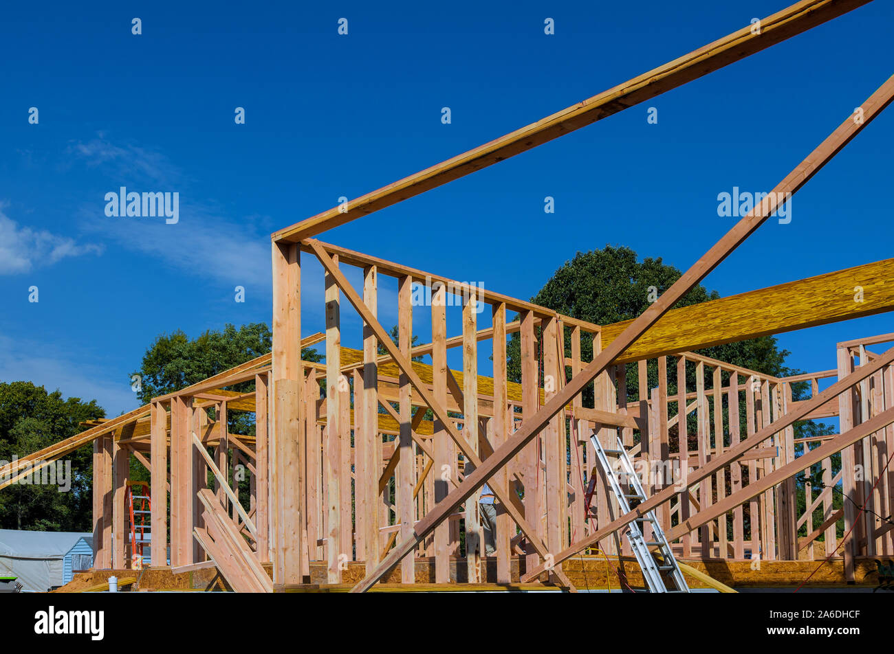 Exterior view construction new residential home framing Stock Photo - Alamy