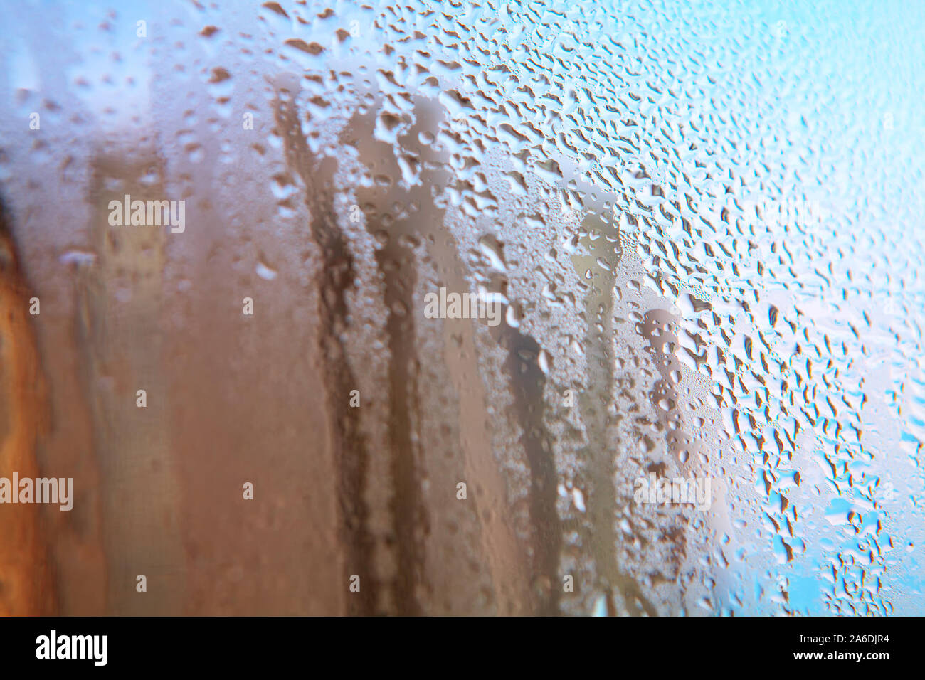 melting ice and drops on the window glass Stock Photo - Alamy