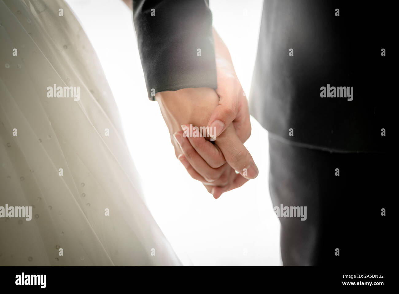 Selective focus and close up at the diamond ring on finger of bride ...