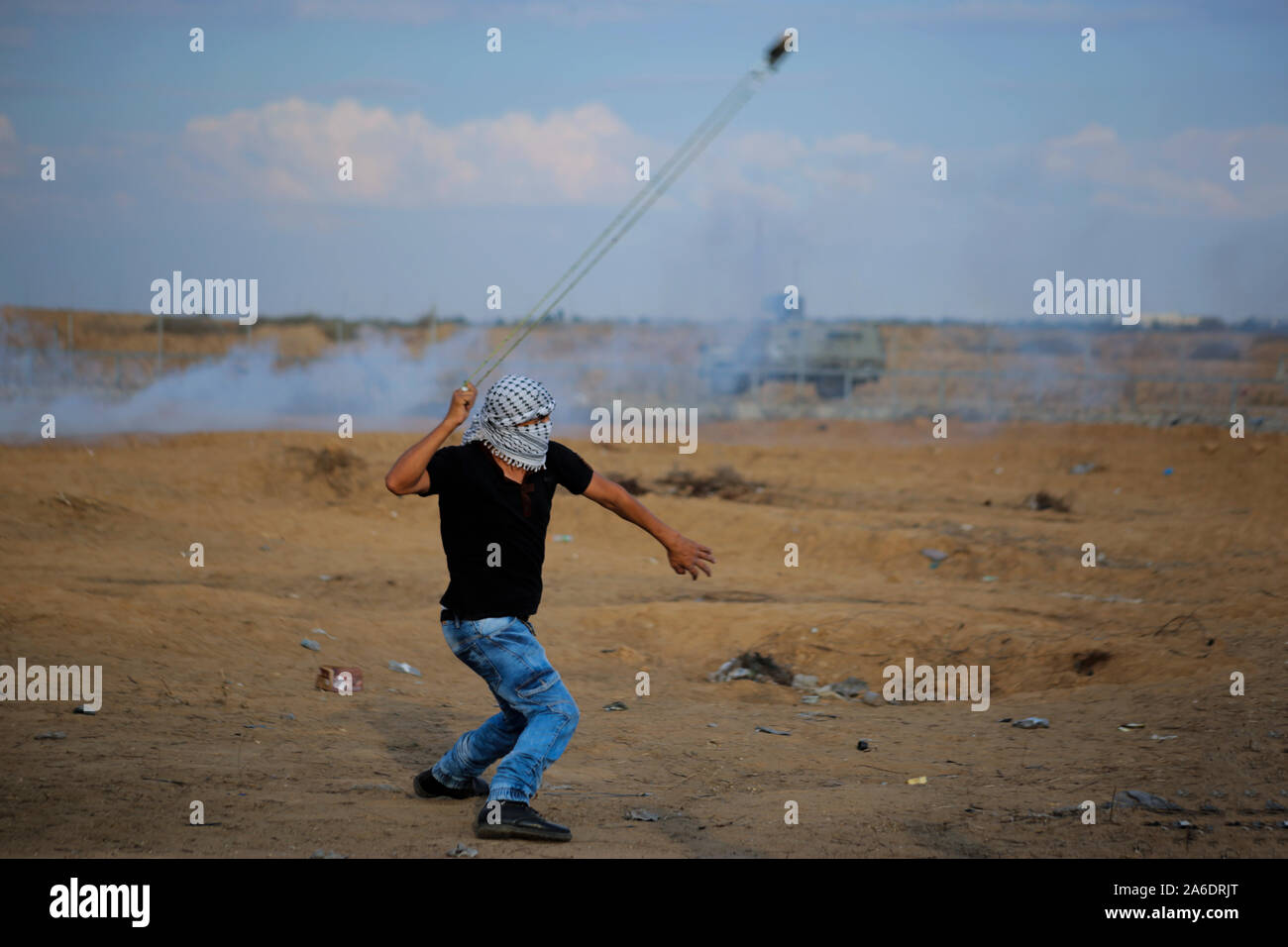 Gaza, Palestine. 25th Oct, 2019. A Palestinian demonstrator holds a ...