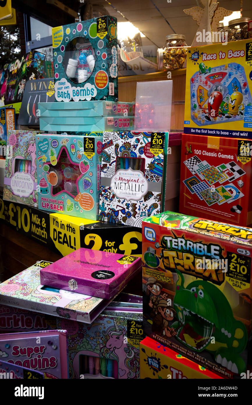 shop window display of children boxed games Stock Photo - Alamy