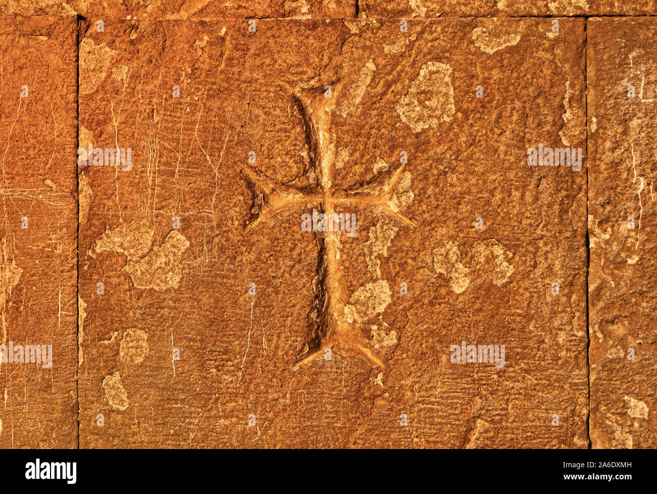 cross on the wall of the temple Stock Photo - Alamy