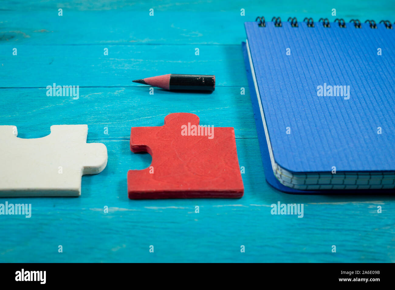 Problem solving and teamwork concept with colorful puzzle pieces in red ...