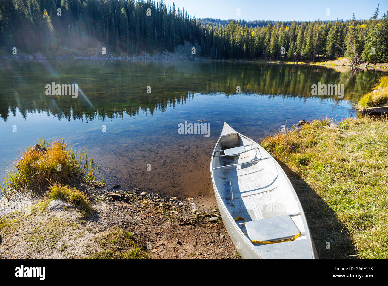 Canoe on the lake in Canadian Rocky Stock Photo - Alamy