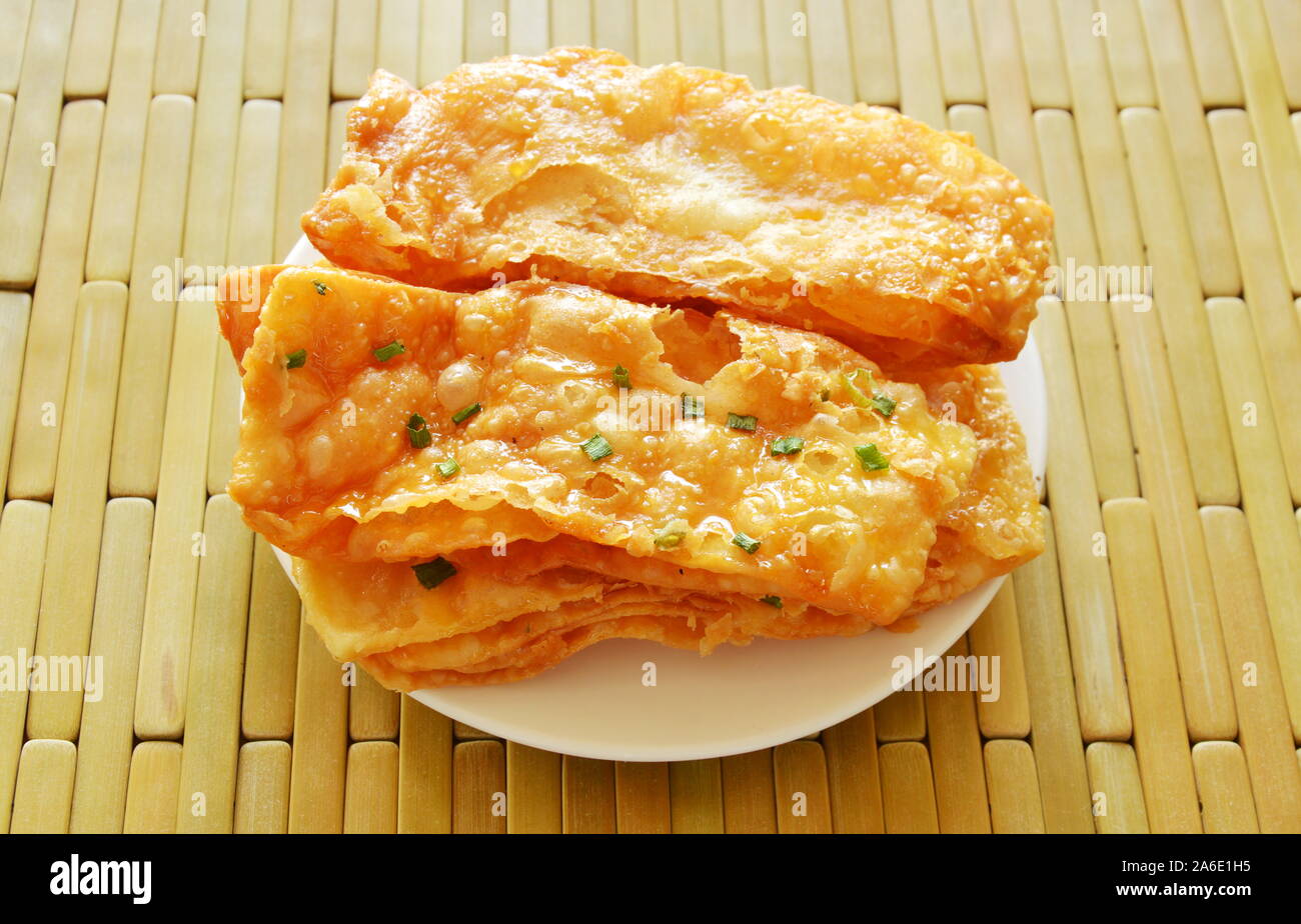 crispy sweet Roti Indian food made of flour on dish Stock Photo - Alamy