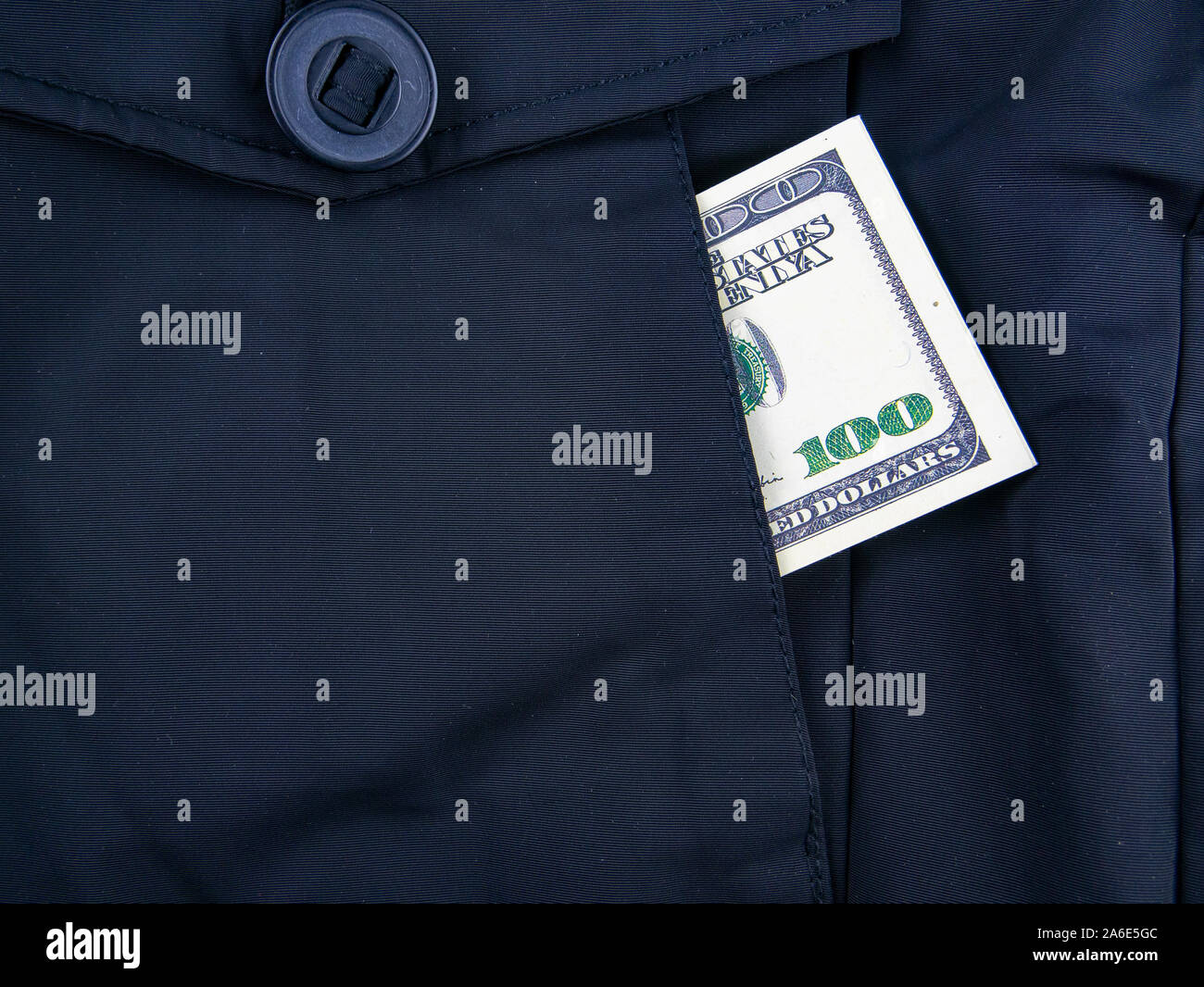 Money dollars in a jacket pocket. Place for text Stock Photo - Alamy