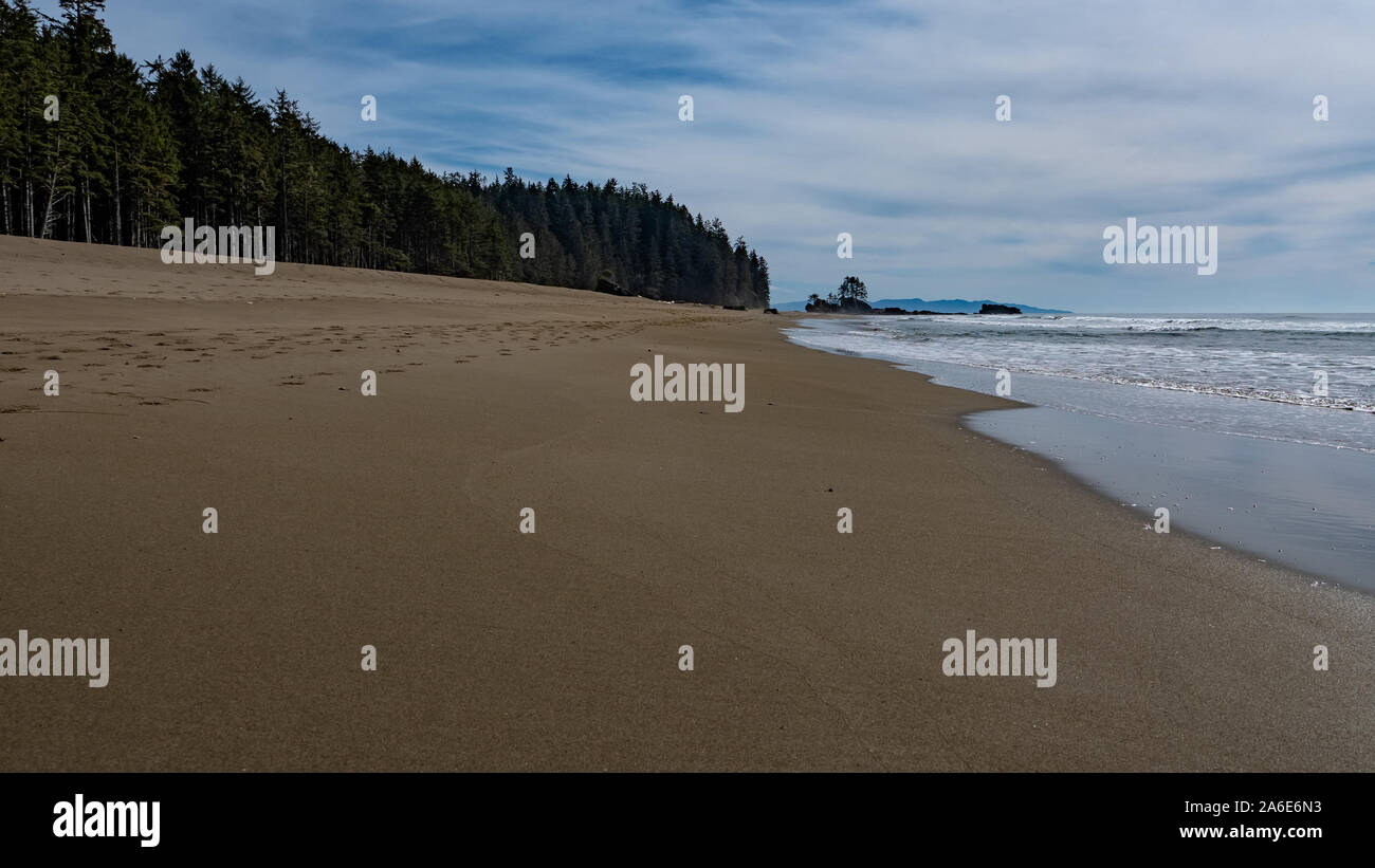 An amazing sandy beach along the west coast trail of Vancouver Island ...