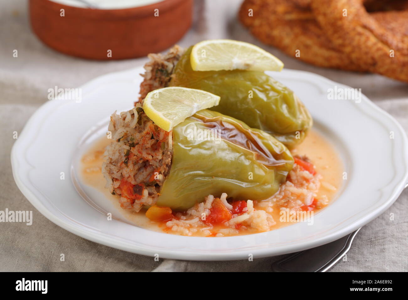 Turkish dish biber dolma, pepper stuffed with meat and rice and topped ...