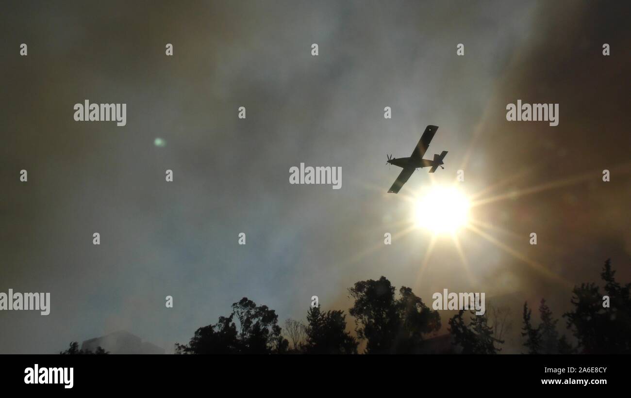 Airplanes fly for dropping fire retardant on forest fires Stock Photo ...