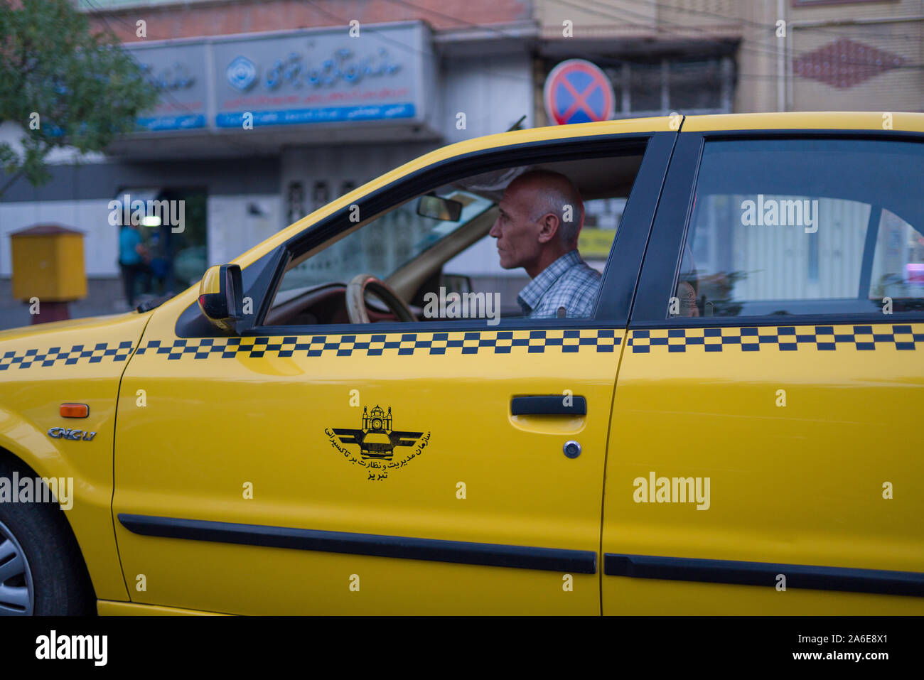 Tabriz, Iran - 11 August 2019 : Taxi, taxi driver and taxi passenger in ...