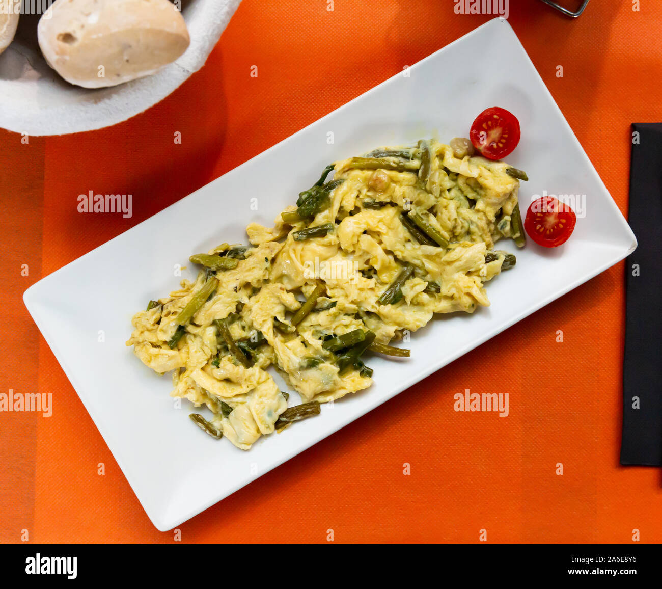 Traditional Spanish revoltillo - scrambled eggs with garlic, shrimp and ...