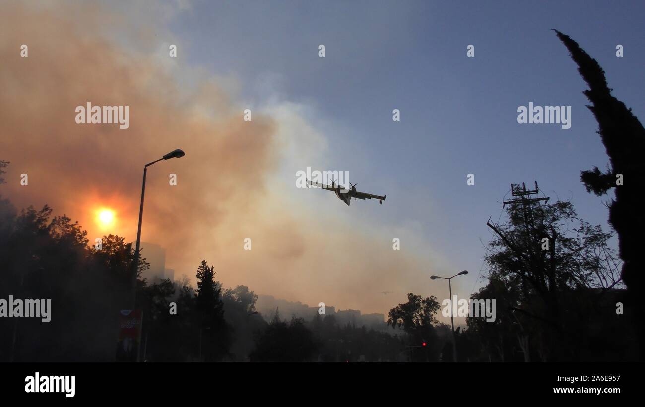 Airplanes fly for dropping fire retardant on forest fires Stock Photo ...