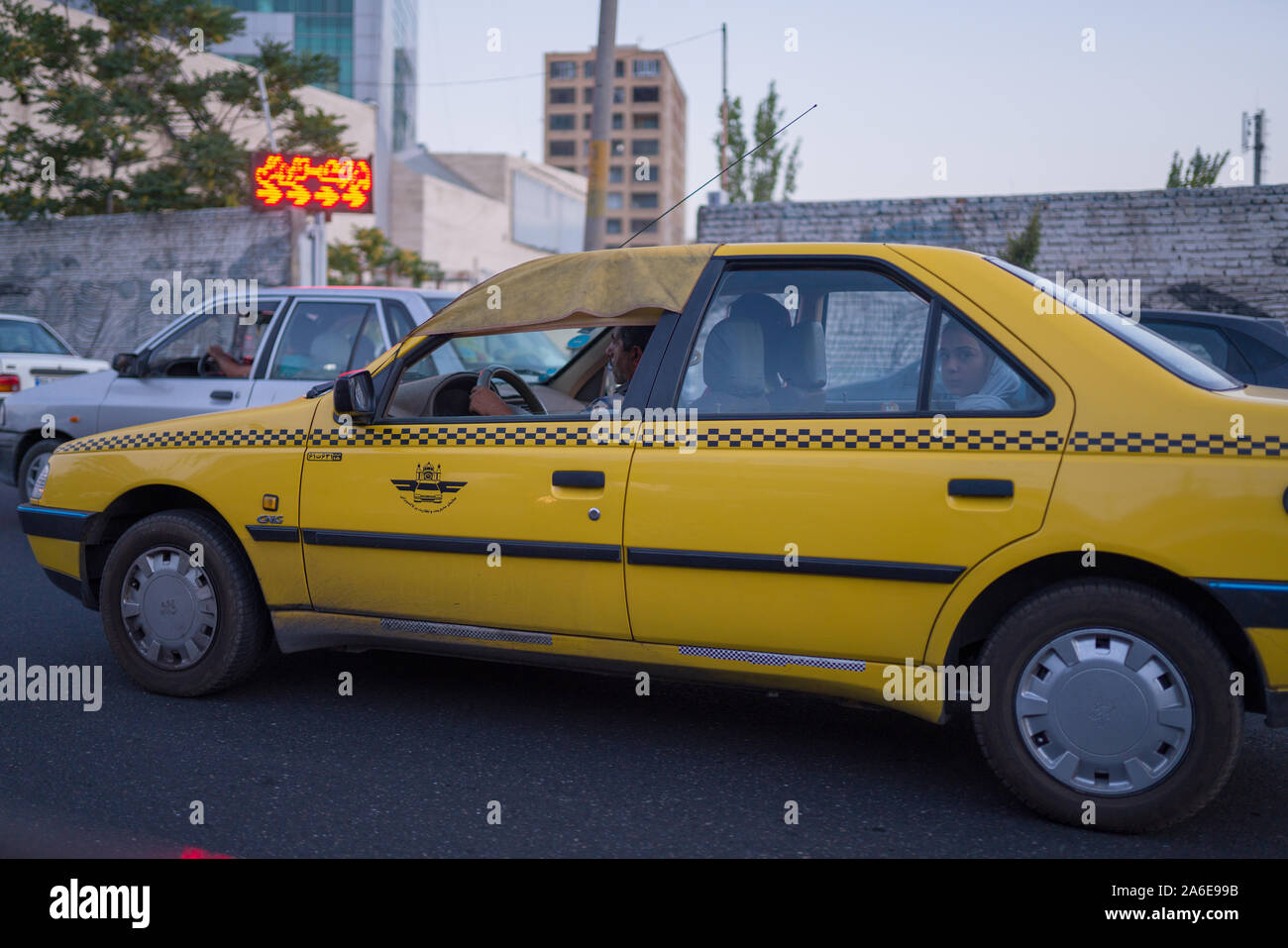 Tabriz, Iran - 11 August 2019 : Taxi, taxi driver and taxi passenger in ...