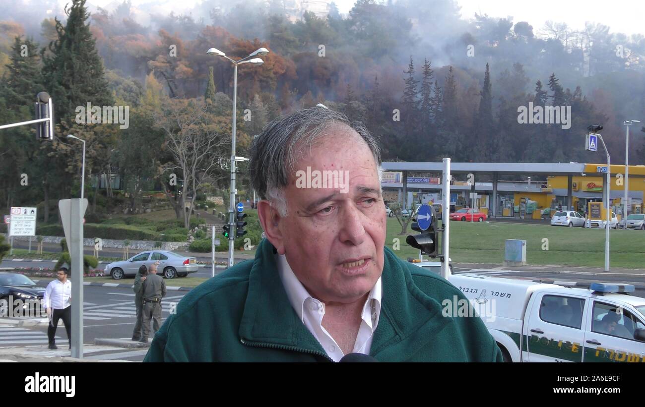 Yona Yahav, Mayor of Haifa, speaks to the press during fires in Haifa ...