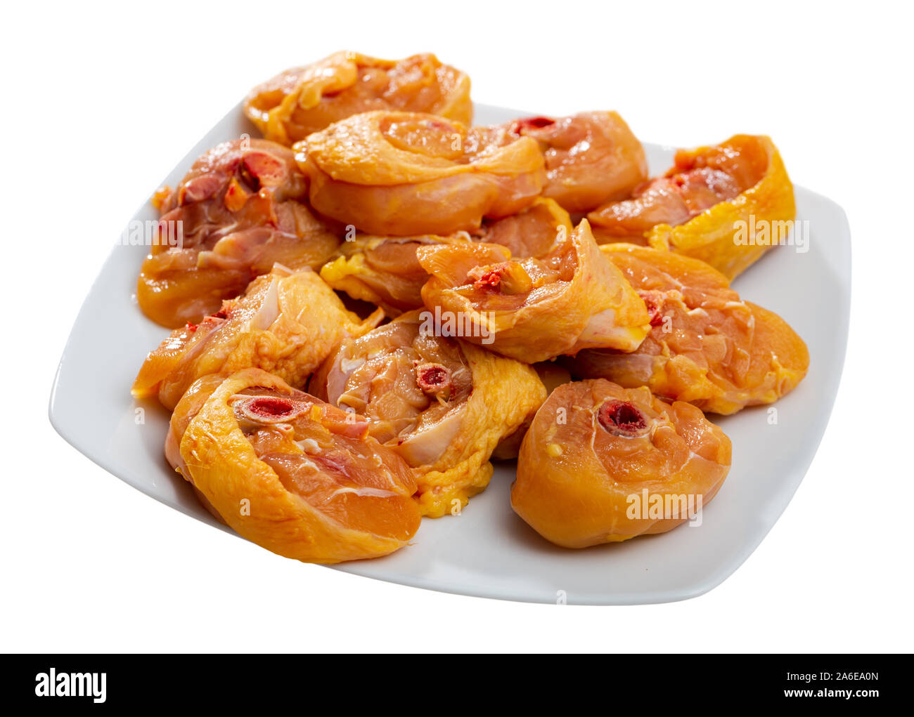 Raw sliced transversely chicken legs. Isolated over white background ...