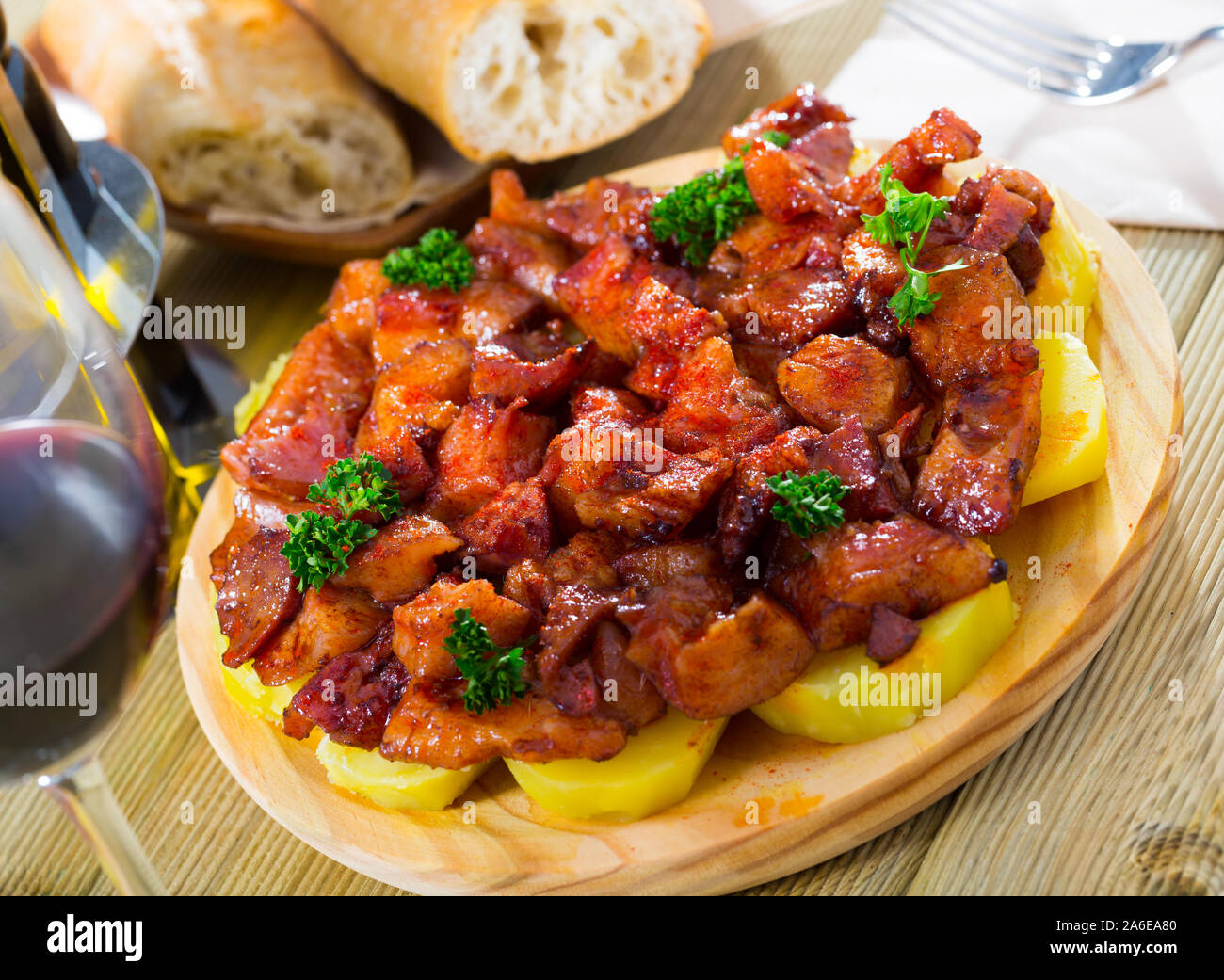 Roasted snouts of pigs with pepper on baked potato – Spanish dish Stock ...