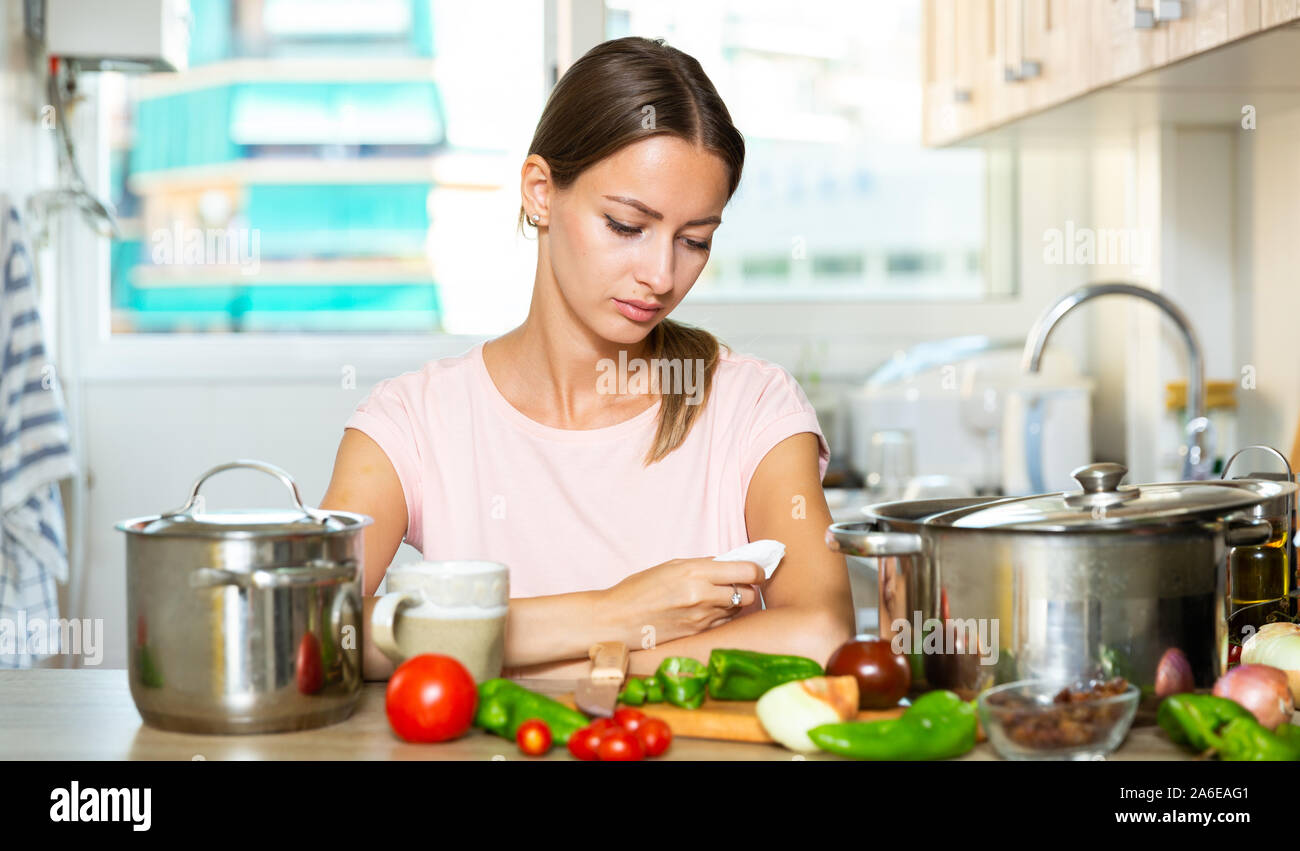 Woman cooking vegetables confused hi-res stock photography and images ...