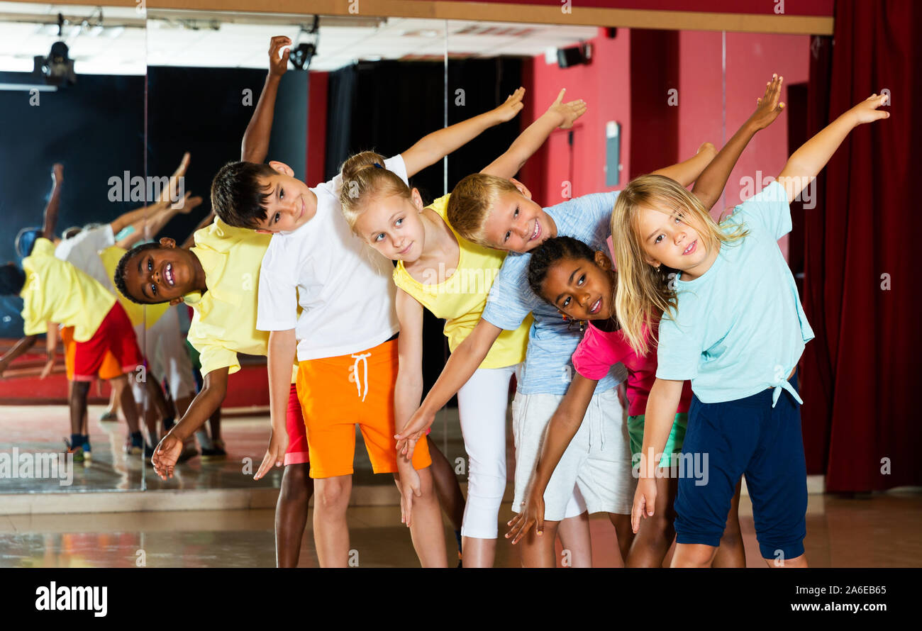 Cheerful children having fun in a choreography class during dance ...