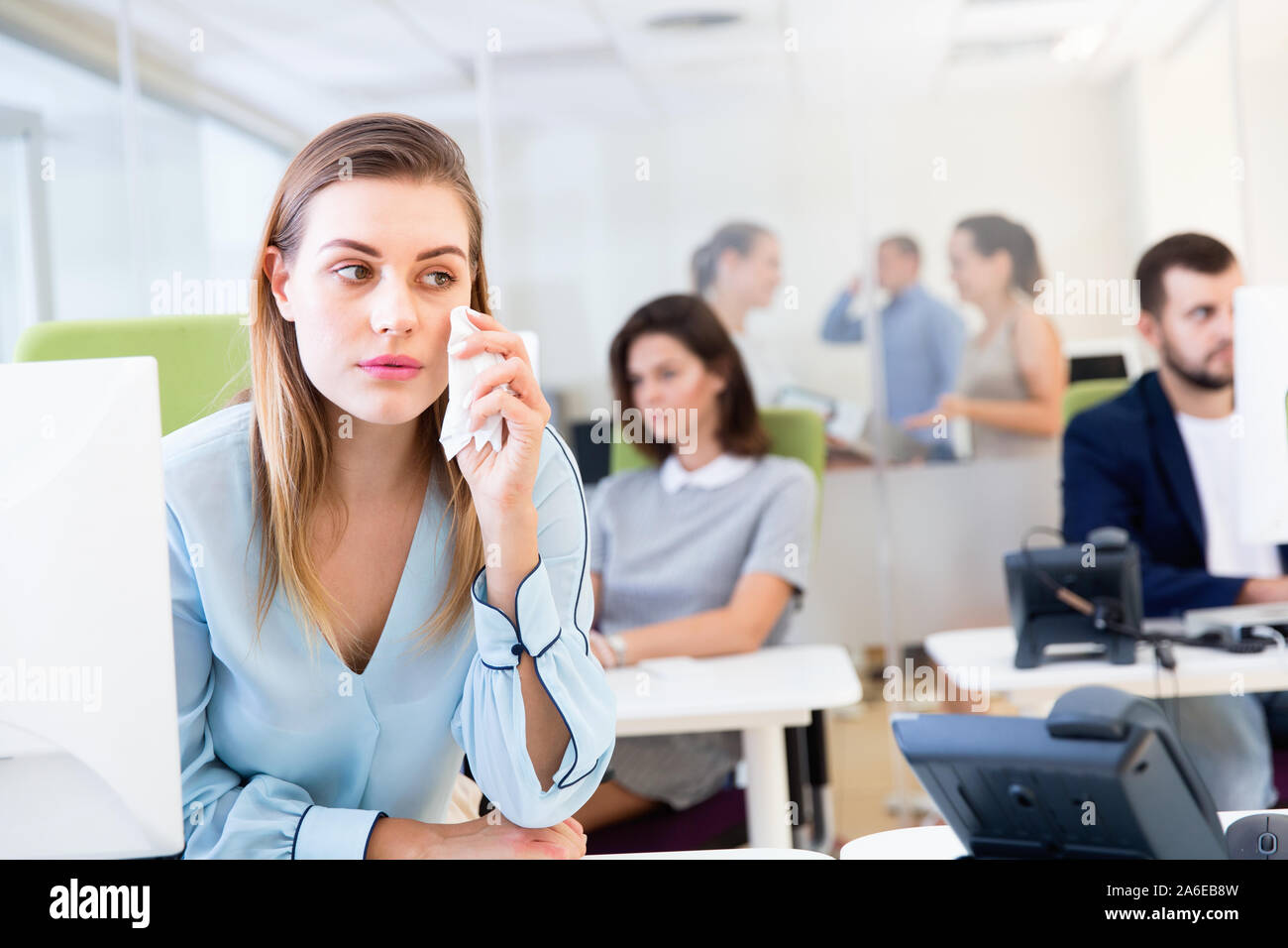 Portrait of frustrated unhappy angry business woman in coworking space ...