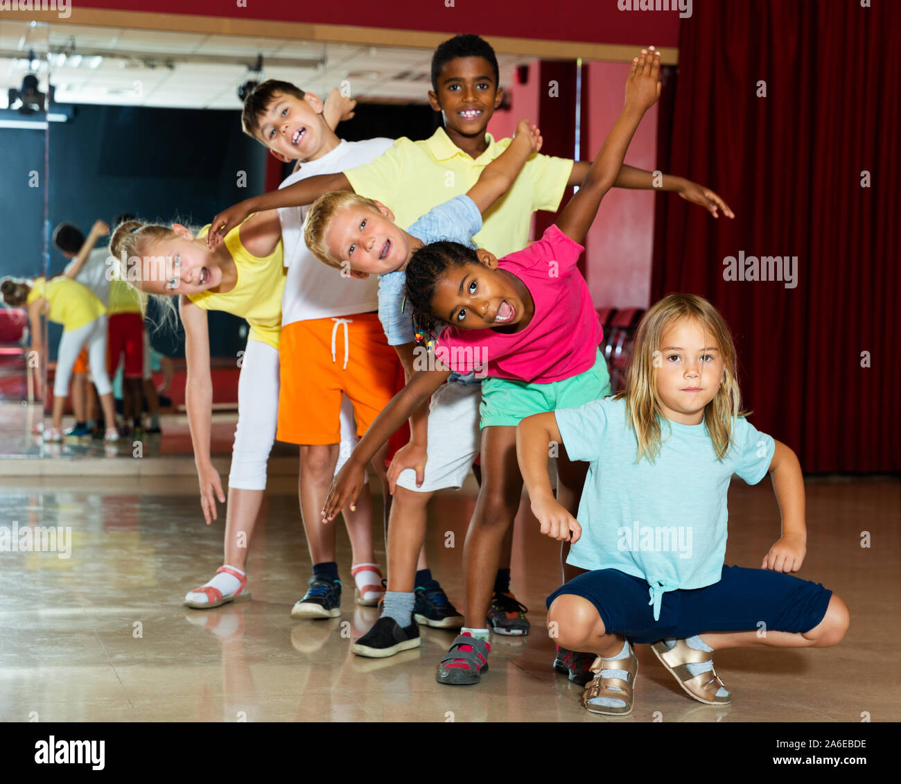 Happy kids having fun in a choreography studio during dance lesson ...