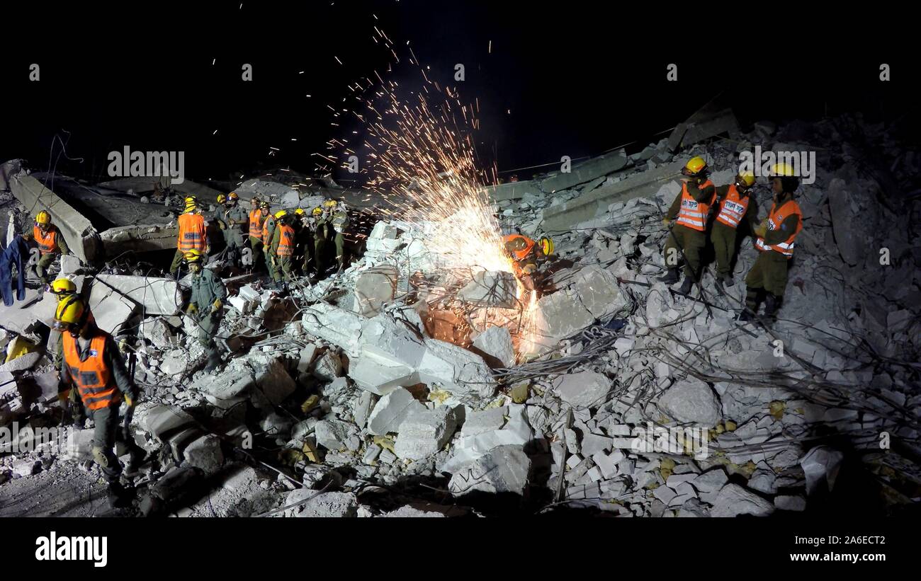 Homeland Security Soldier cuts steel in search for earthquake rocket ...