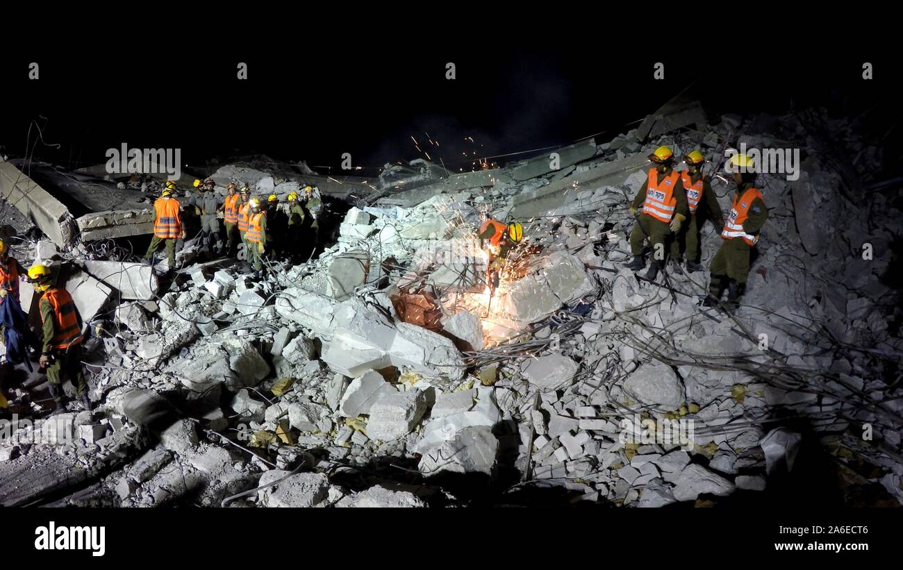 Homeland Security Soldier cuts steel in search for earthquake rocket ...
