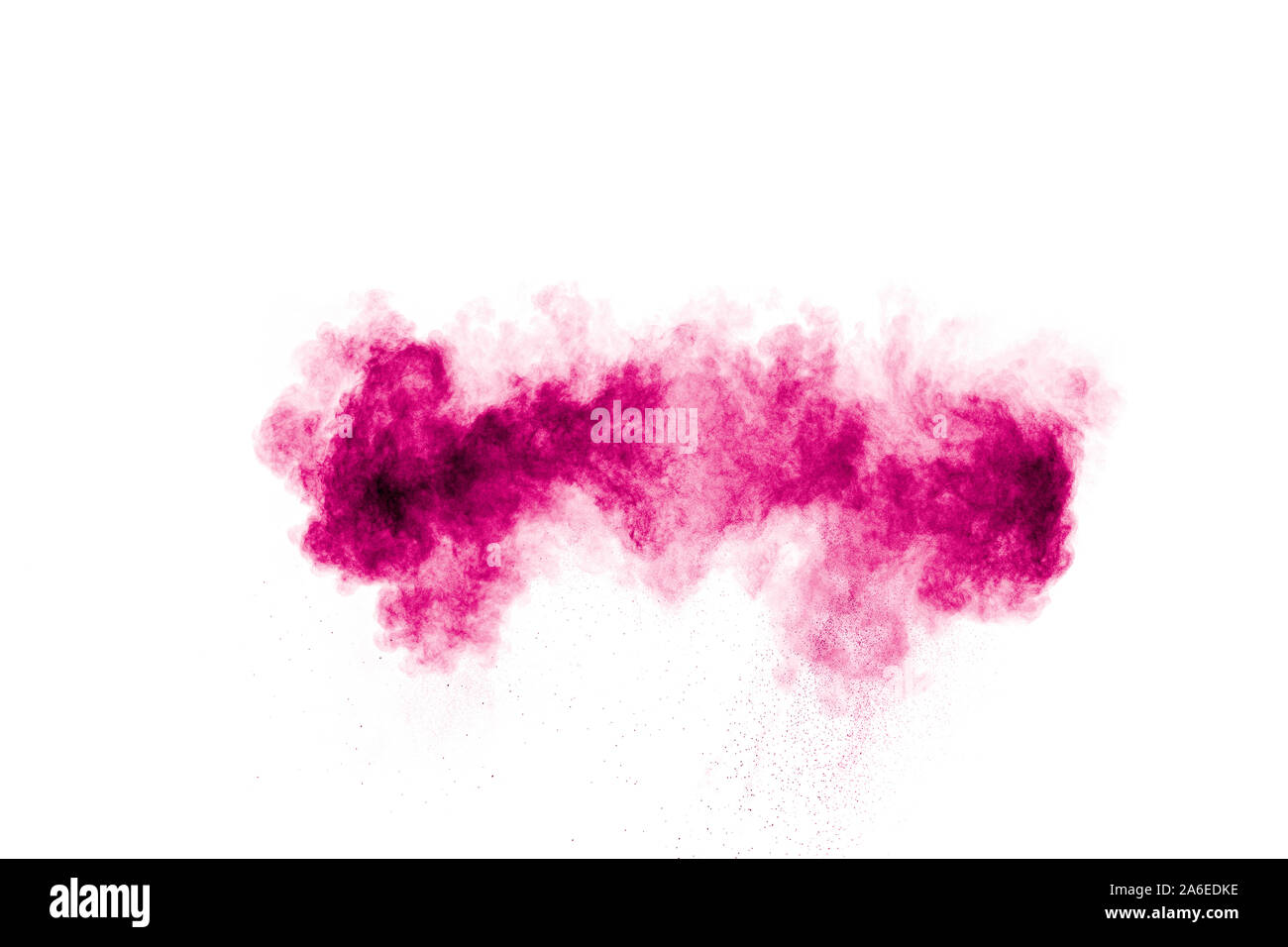 Abstract pink dust explosion on white background. Freeze motion of pink ...