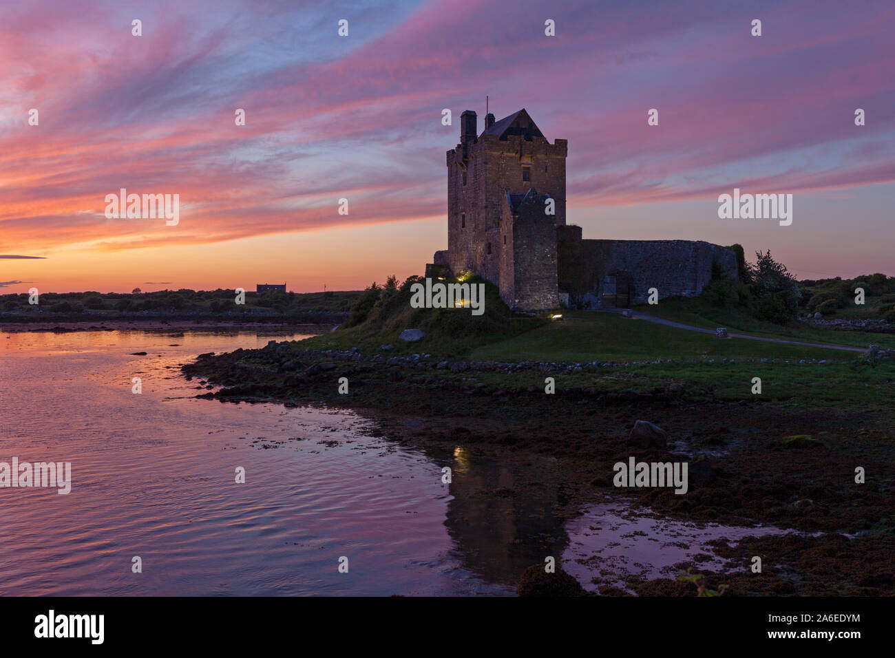 Sunset at Dunguaire Castle, Kinvara, Republic of Ireland Stock Photo ...