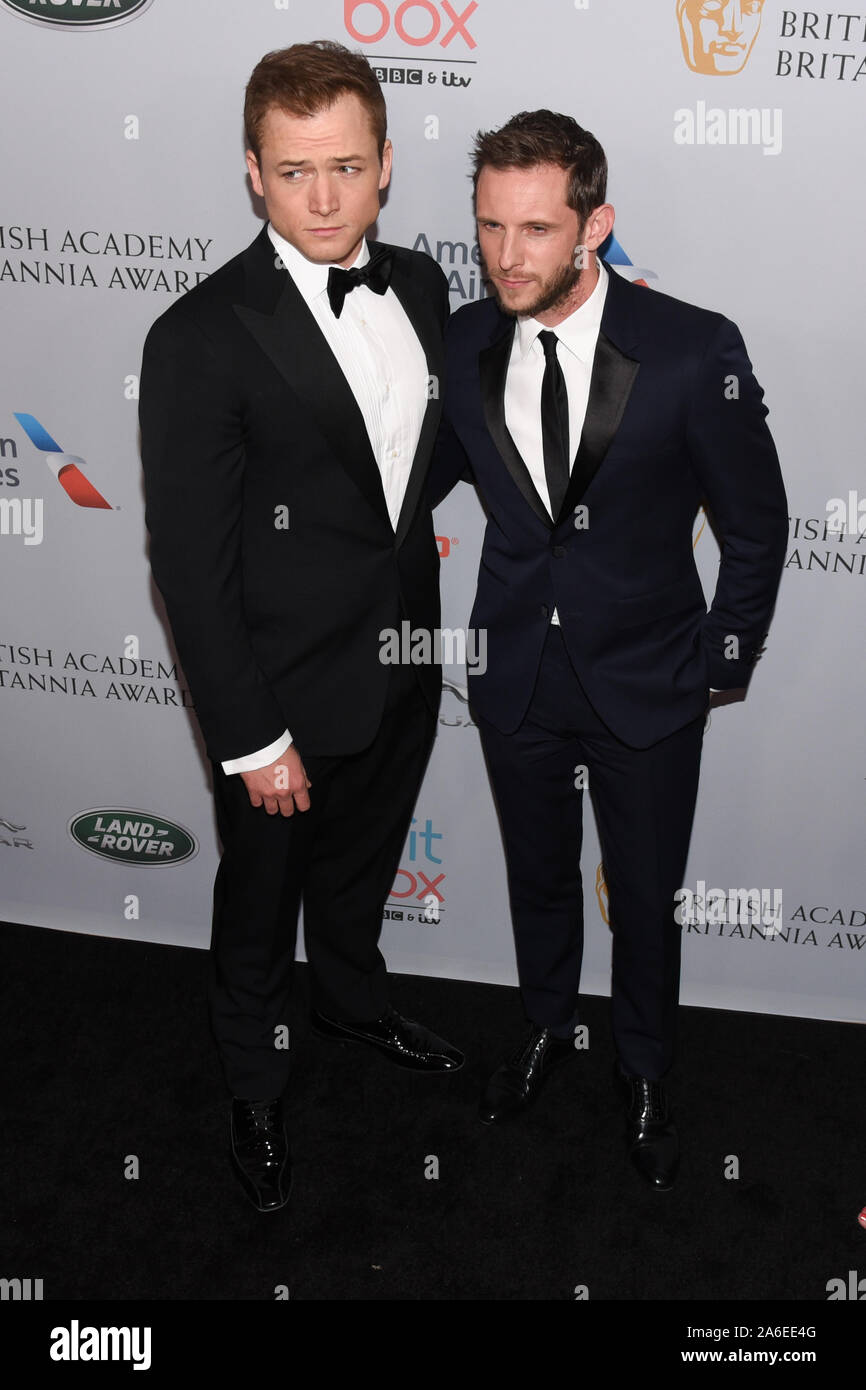 October 25, 2019, Beverly Hills, California, USA: Taron Egerton and ...