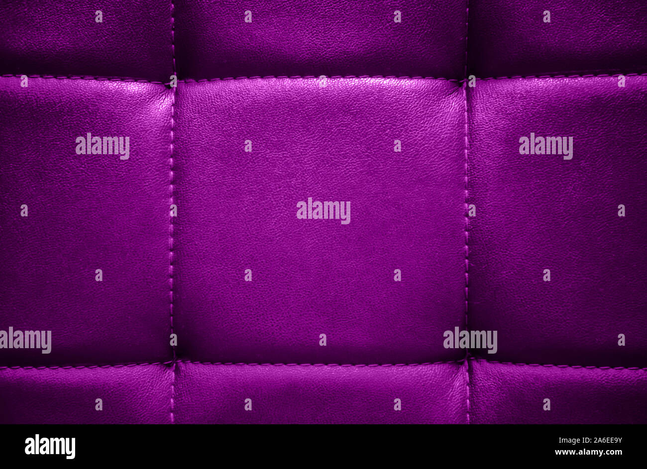 Shiny dark lilac artificial textured leather stitched with thread ...