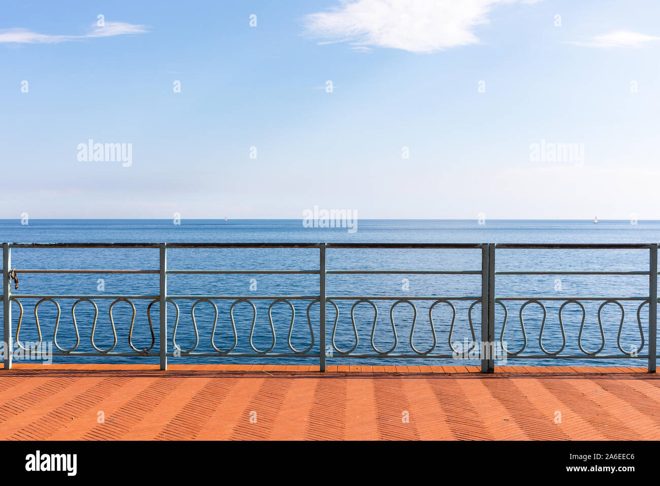 Railing at beachfront boardwalk in Nervi Italy Stock Photo - Alamy