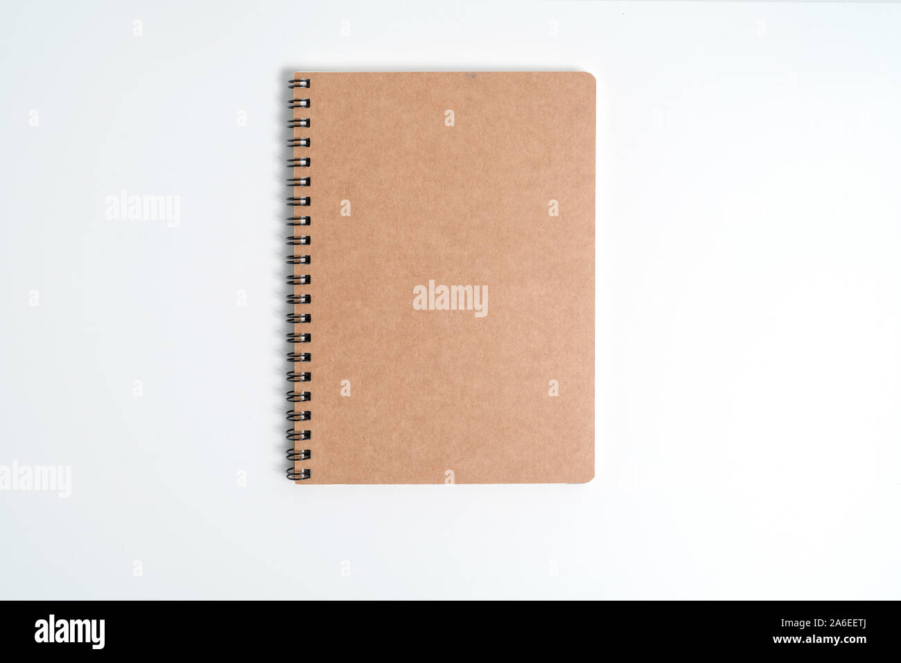 Brown spiral notebook isolated on white background.top view Stock Photo ...