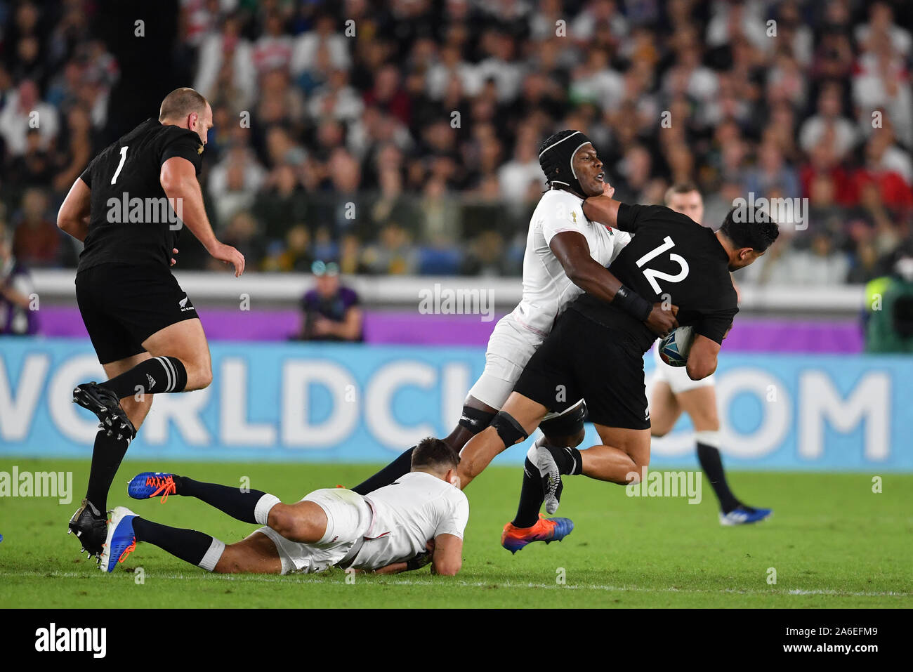 New Zealand's Anton Lienert-Brown is tackled by England's Maro Itoje ...