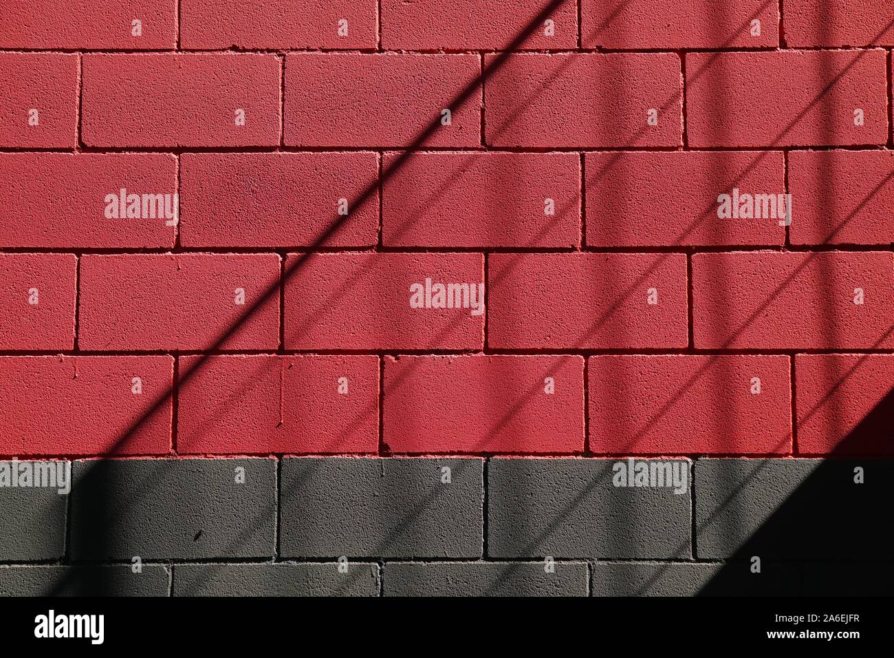 old red wall of the building on the street Stock Photo - Alamy