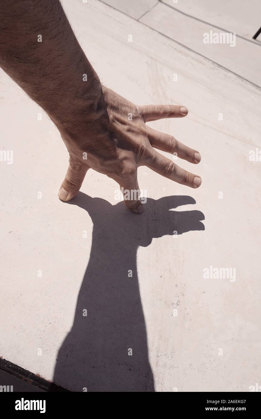 man hand shadow silhouette on the wall Stock Photo - Alamy