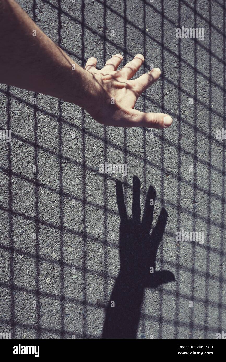 man hand shadow silhouette on the wall Stock Photo - Alamy