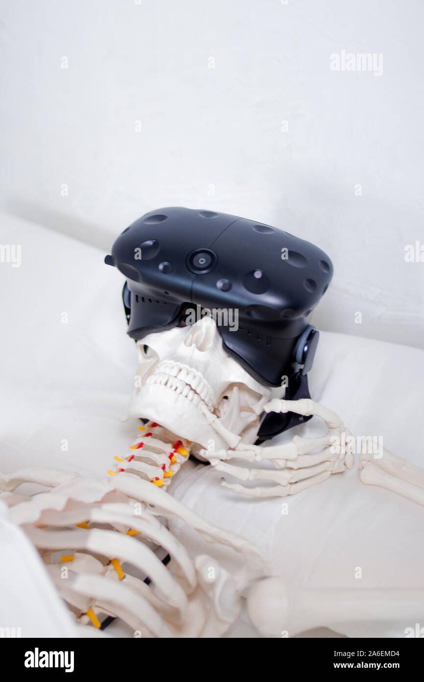 Danger of VR. Horrors of future technology. Skull in VR glasses. The ...