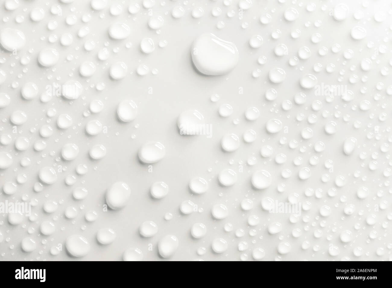Water drops on smooth white background, close-up Stock Photo - Alamy