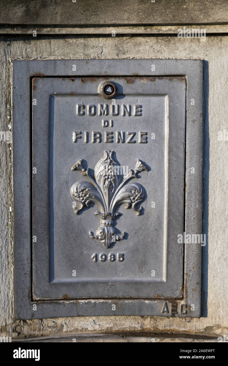 Plaque with the coat of arms of the city of Florence on a public ...