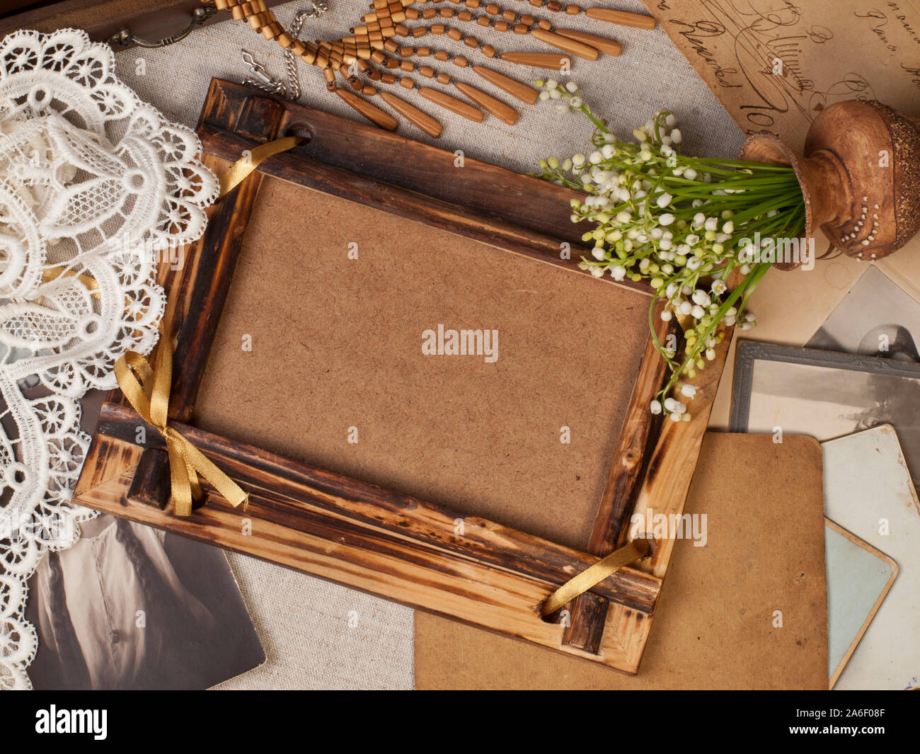 Still life with old pictures and frame for a photo Stock Photo - Alamy