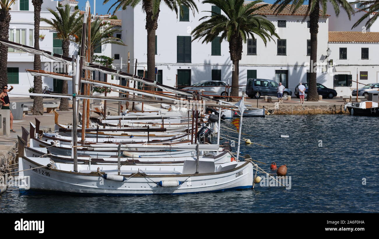Fornells Harbour Traditional fishing boats moored up on the quay ...