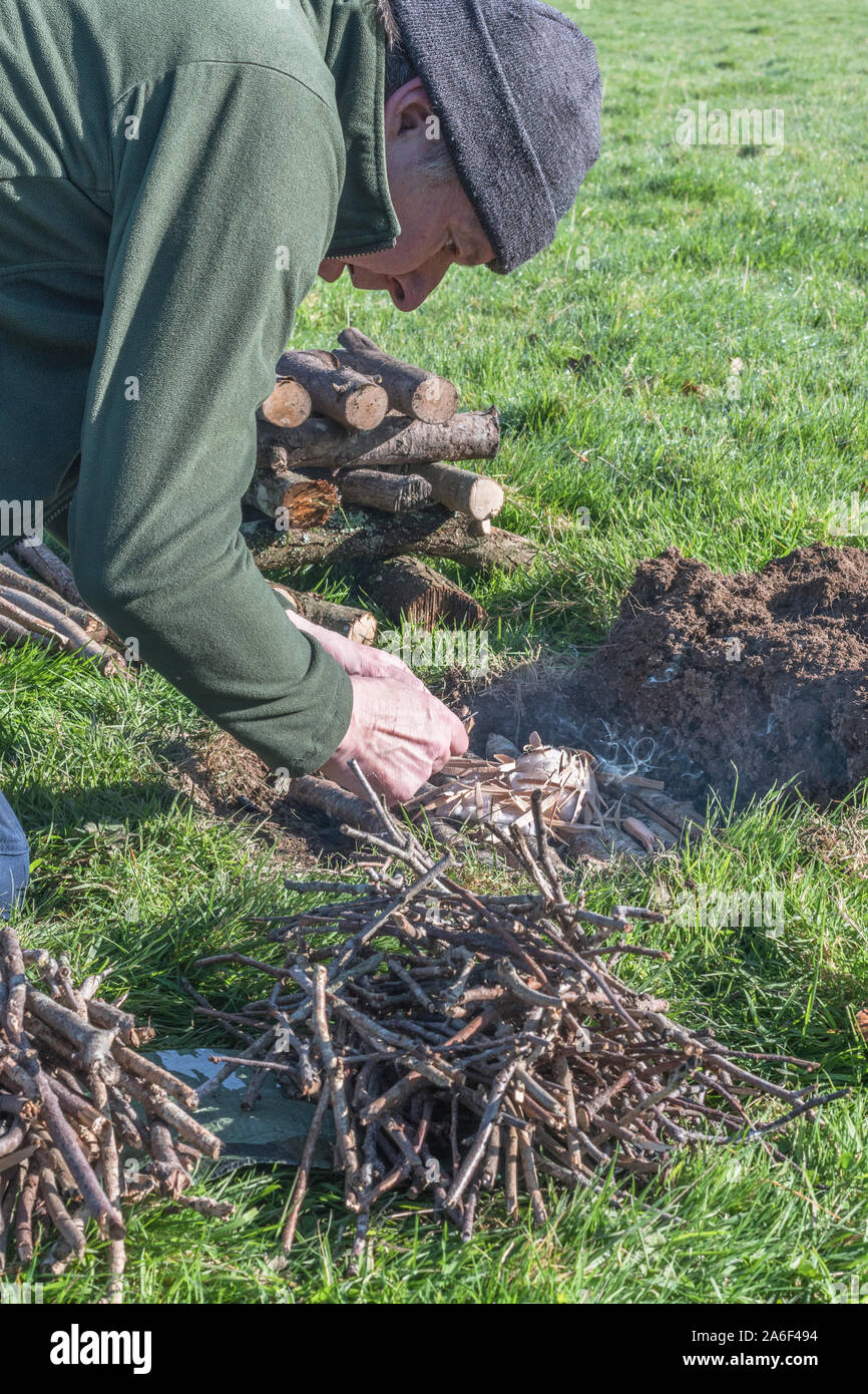 Sequential series of building and lighting survival fire or camp fire ...
