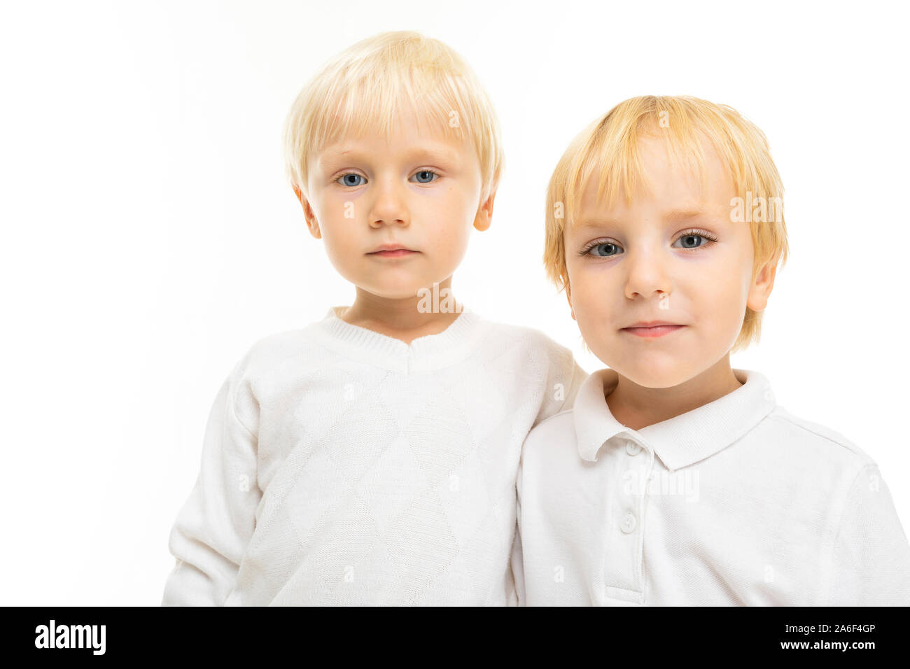 Little boys brothers with short light and red hair, blue eyes, cute ...