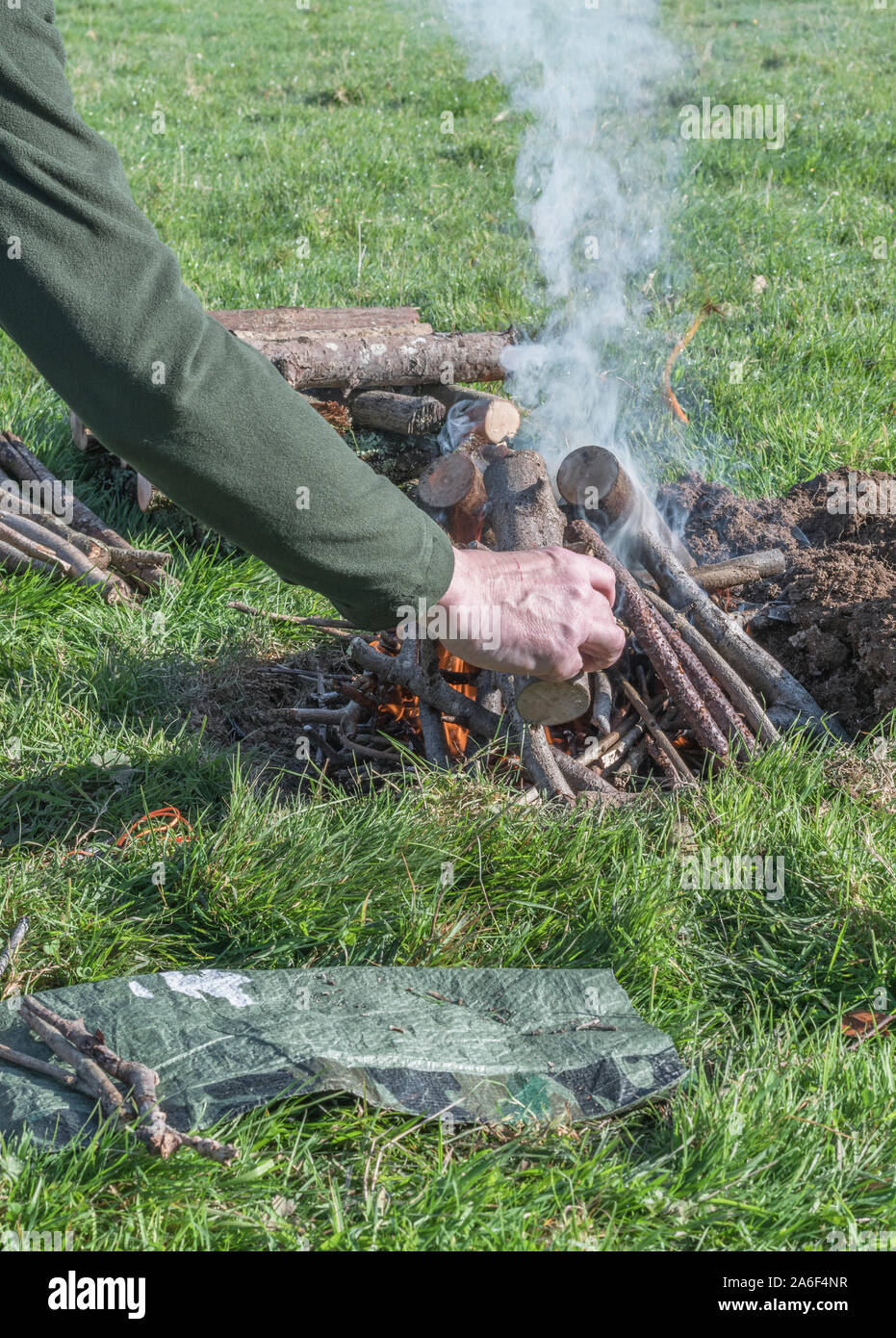 Sequential series of building and lighting survival fire or camp fire ...