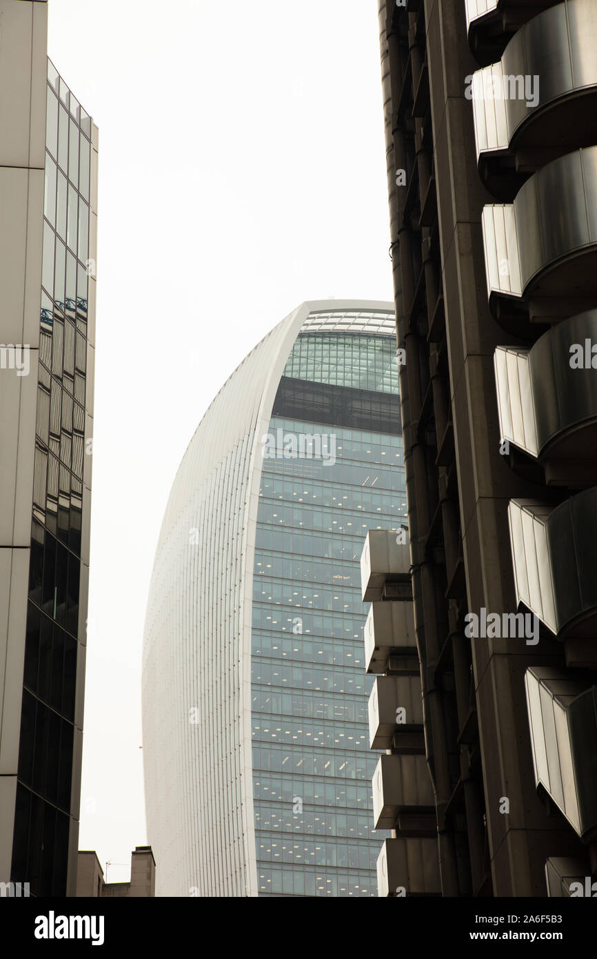 Office buildings, sometimes contrasting with older style buildings ...