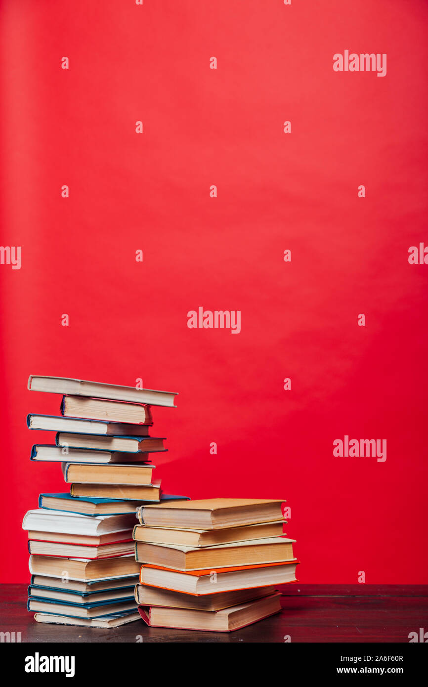 library of many different educational books on a red background Stock ...