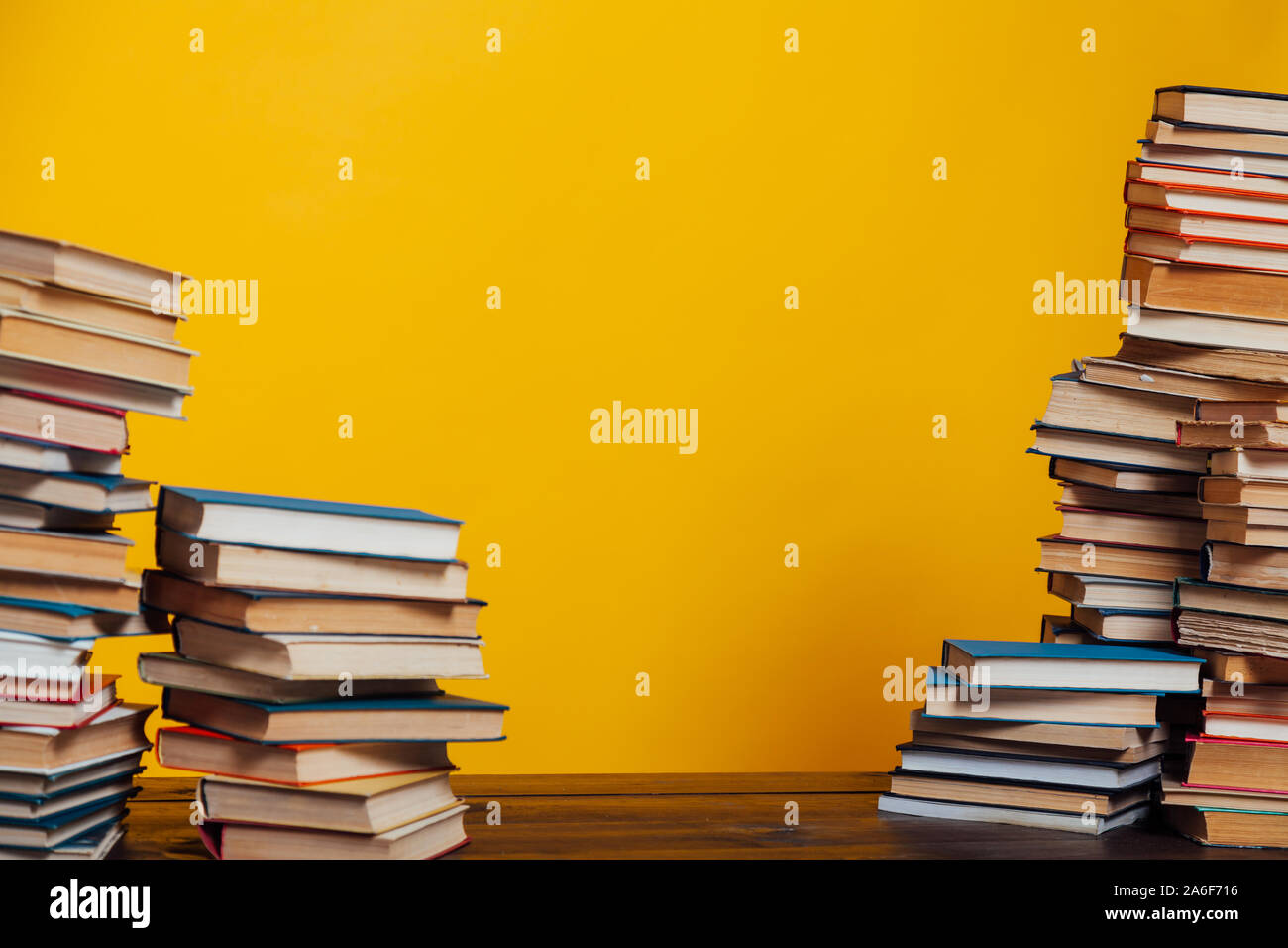 library of many different educational books on a yellow background ...